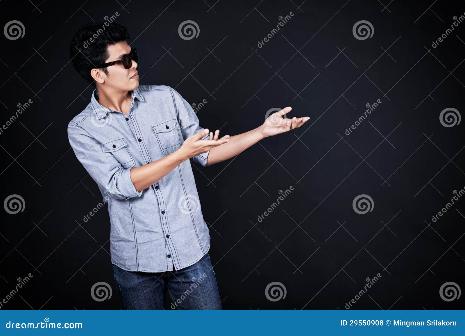 Young Man Presenting and Showing Your Text or Product Stock Photo ...