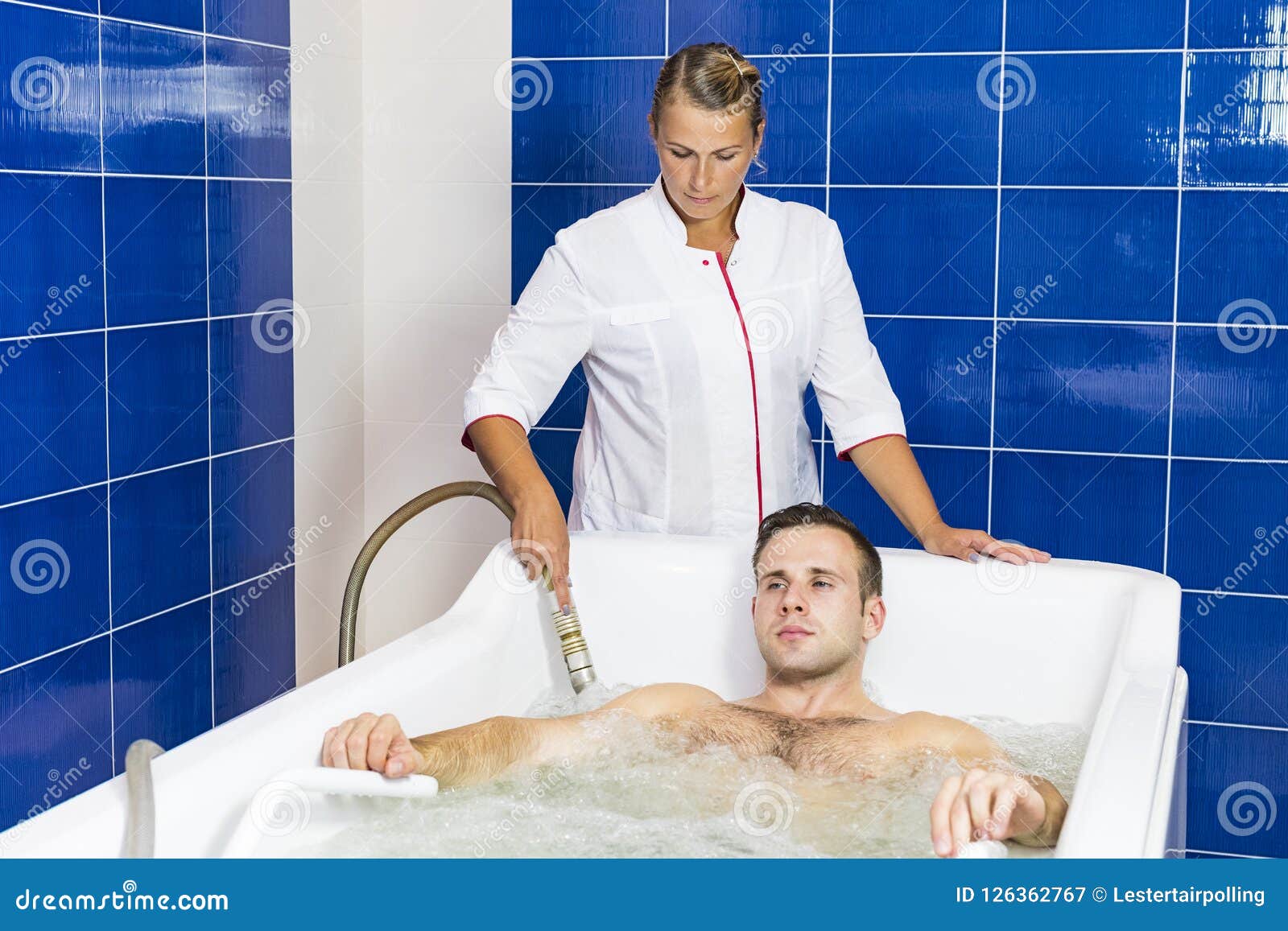 Young Man is the Procedure in the Whirlpool Hydrobath Stock Image ...