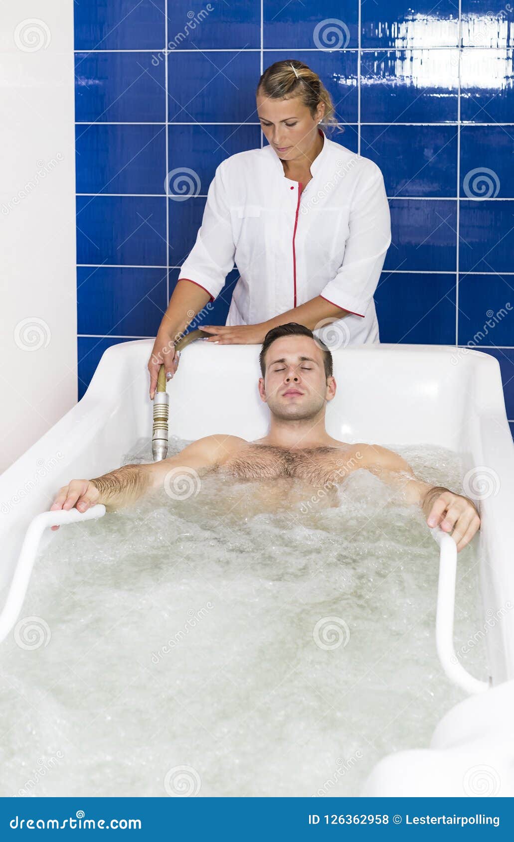 Young Man is the Procedure in the Whirlpool Hydrobath Stock Photo ...