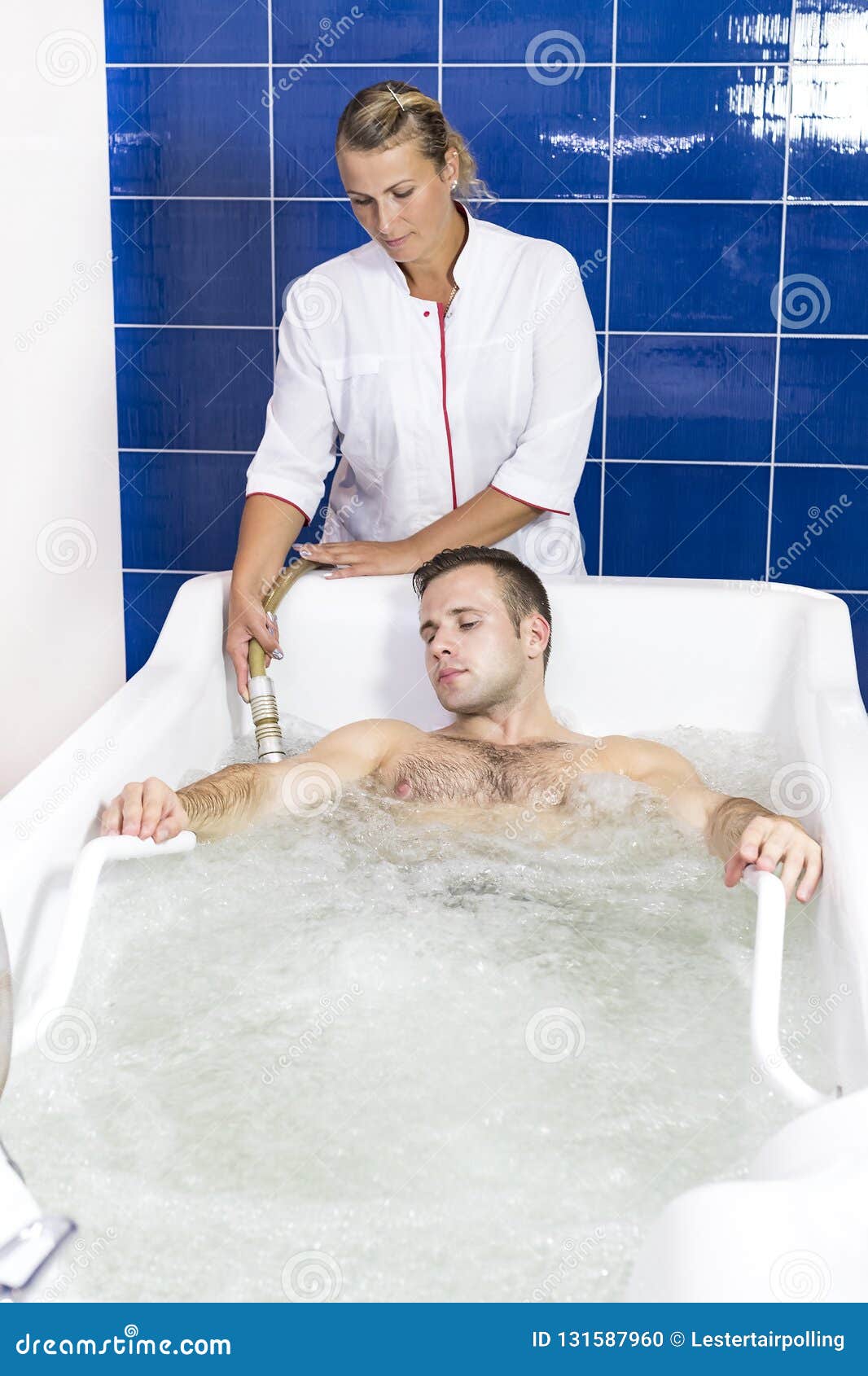 Young Man is the Procedure in the Whirlpool Hydrobath Stock Photo ...