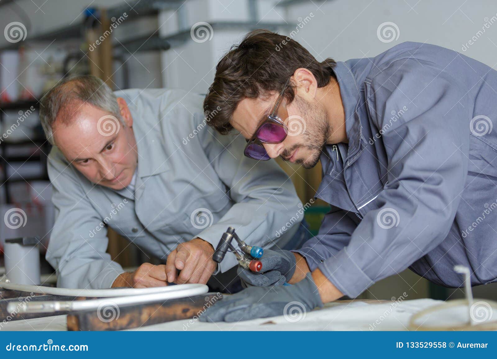Young Man in Professional Training To Become Plumber Stock Photo ...