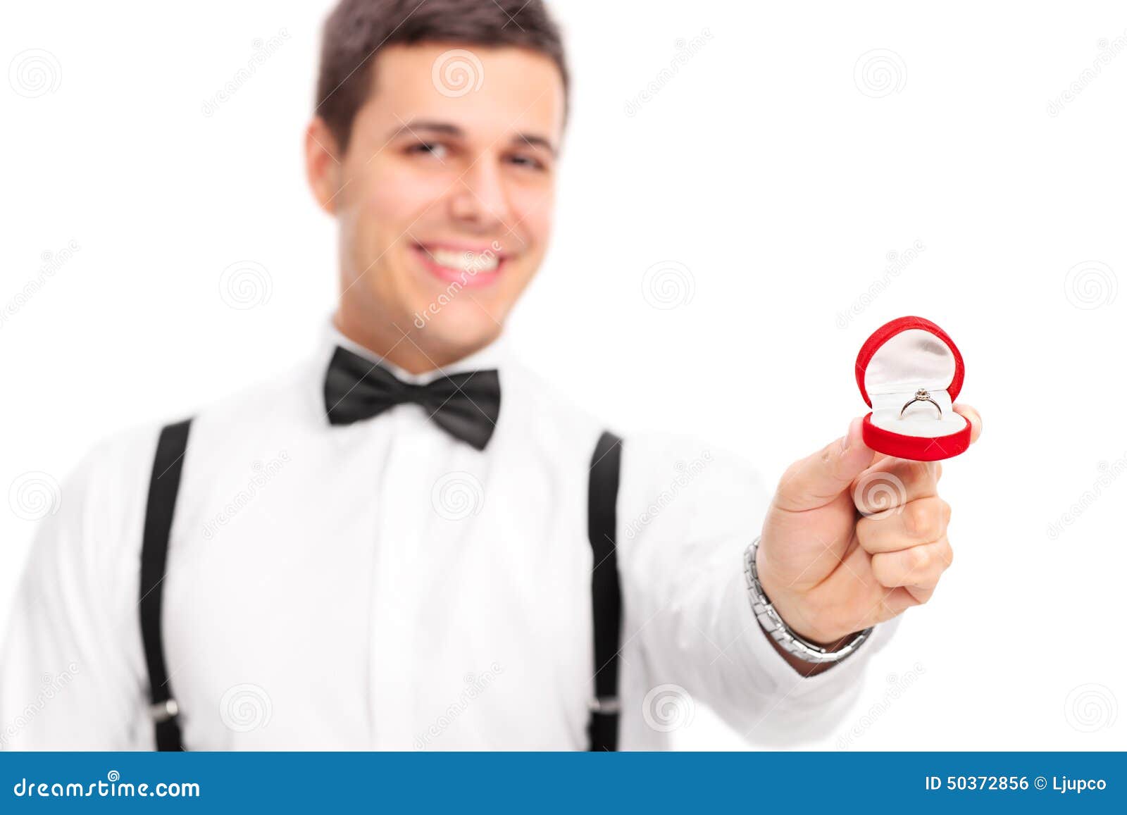 Young Man Proposing with a Diamond Ring Stock Photo - Image of diamond ...