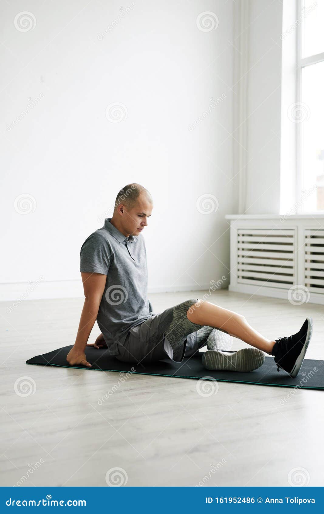 Man Exercising on the Floor Stock Photo - Image of strength, relaxation ...