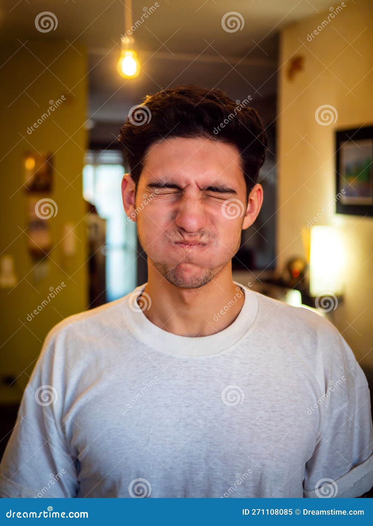 Young Man with Puffed Cheeks, Holding Breath Stock Image - Image of ...