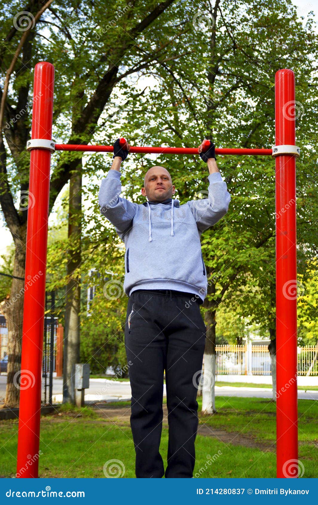 Man Pulls Himself Up on the Bar Stock Image - Image of outdoor ...
