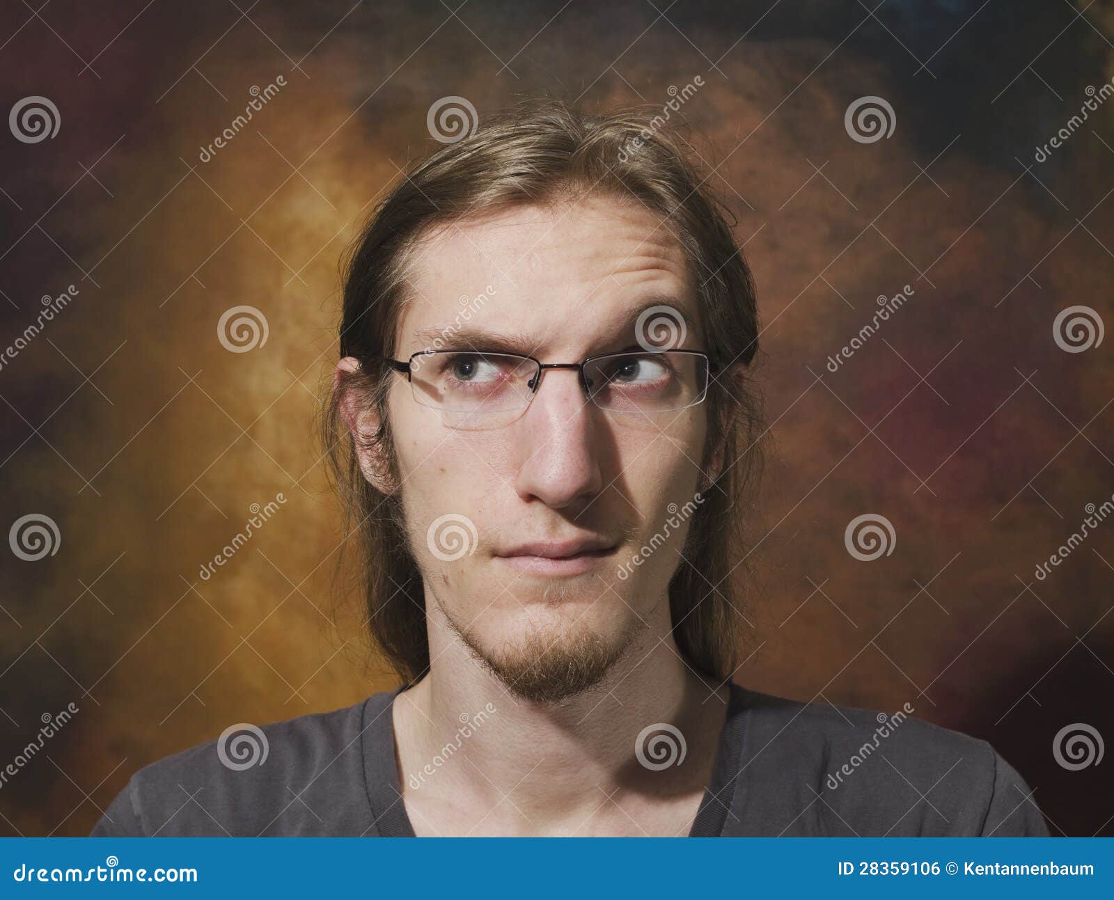 Young Man with Raised Eyebrow Stock Photo - Image of curious, long ...