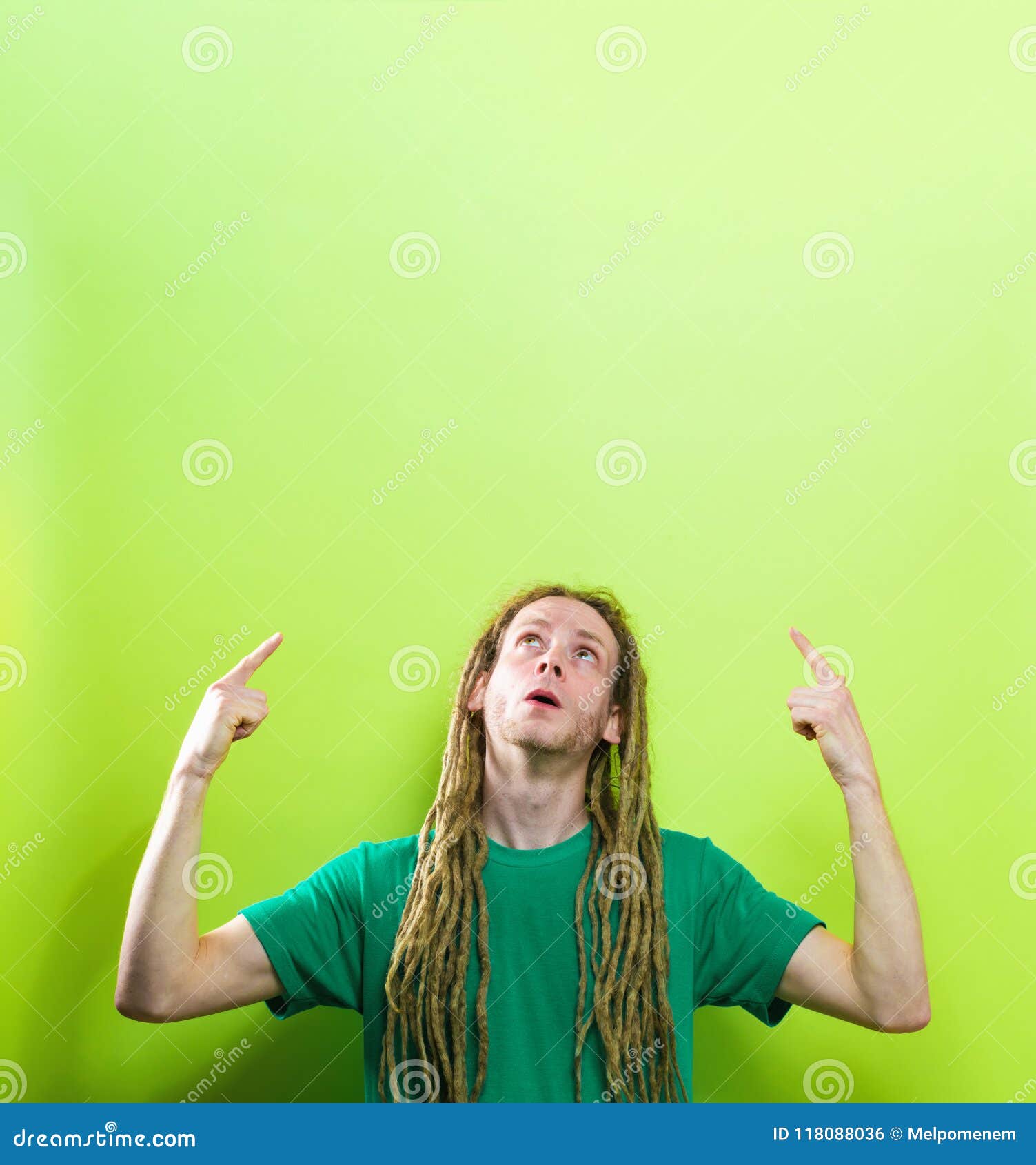 Young Man Reaching and Looking Upwards Stock Photo - Image of face ...