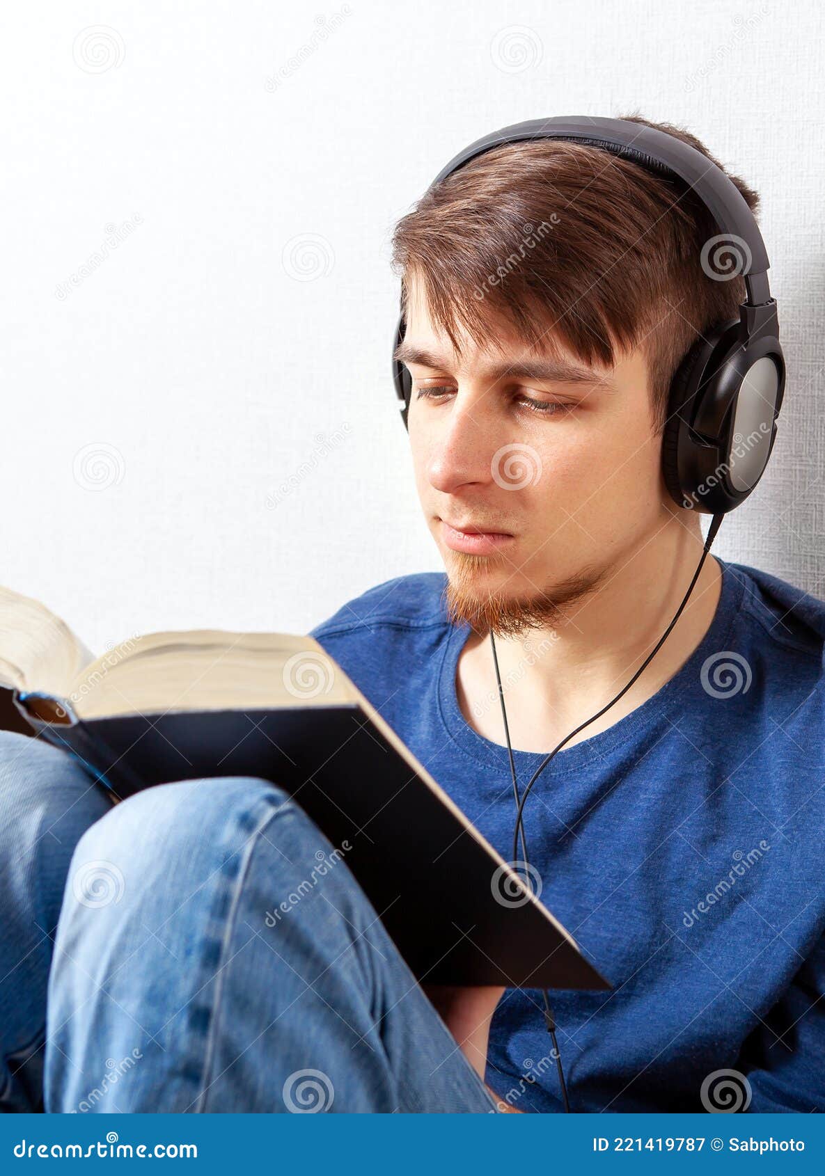 Young Man read a Book stock image. Image of person, large - 221419787