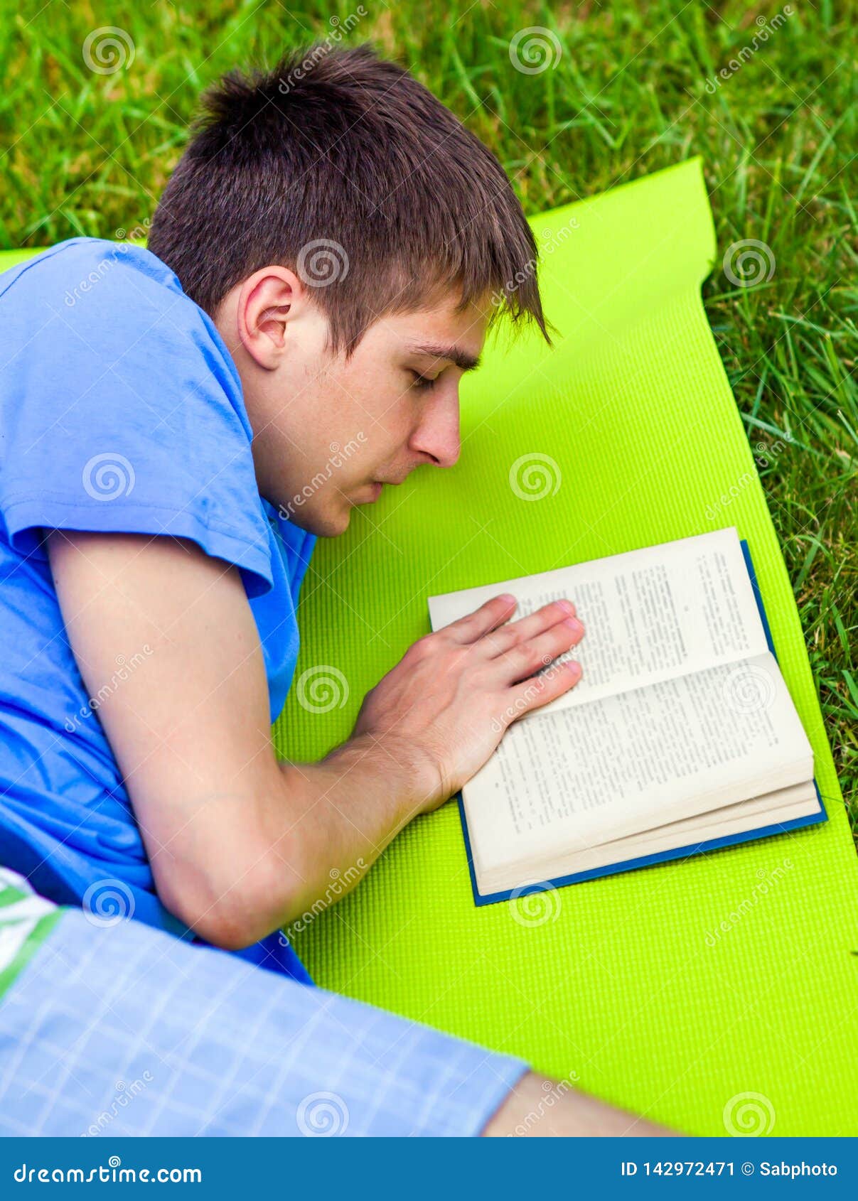 Young Man read a Book stock image. Image of curiosity - 142972471