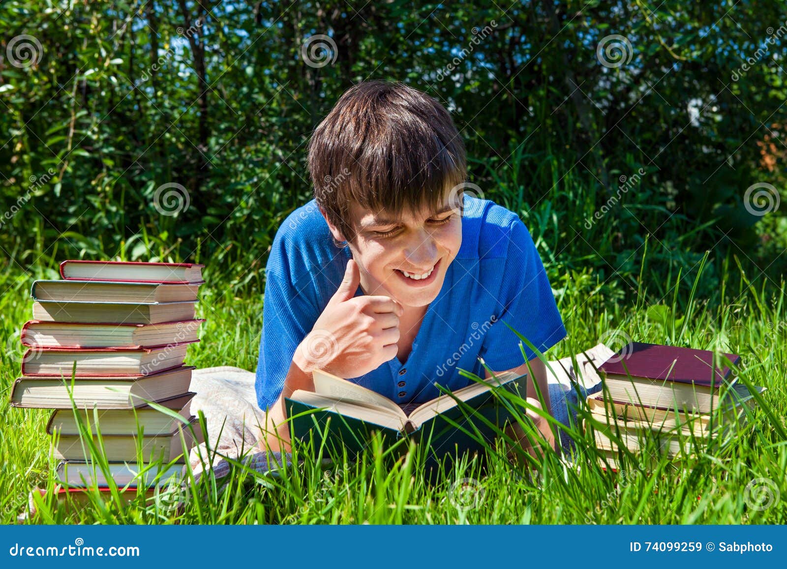 Young Man read a Books stock image. Image of relax, reading - 74099259