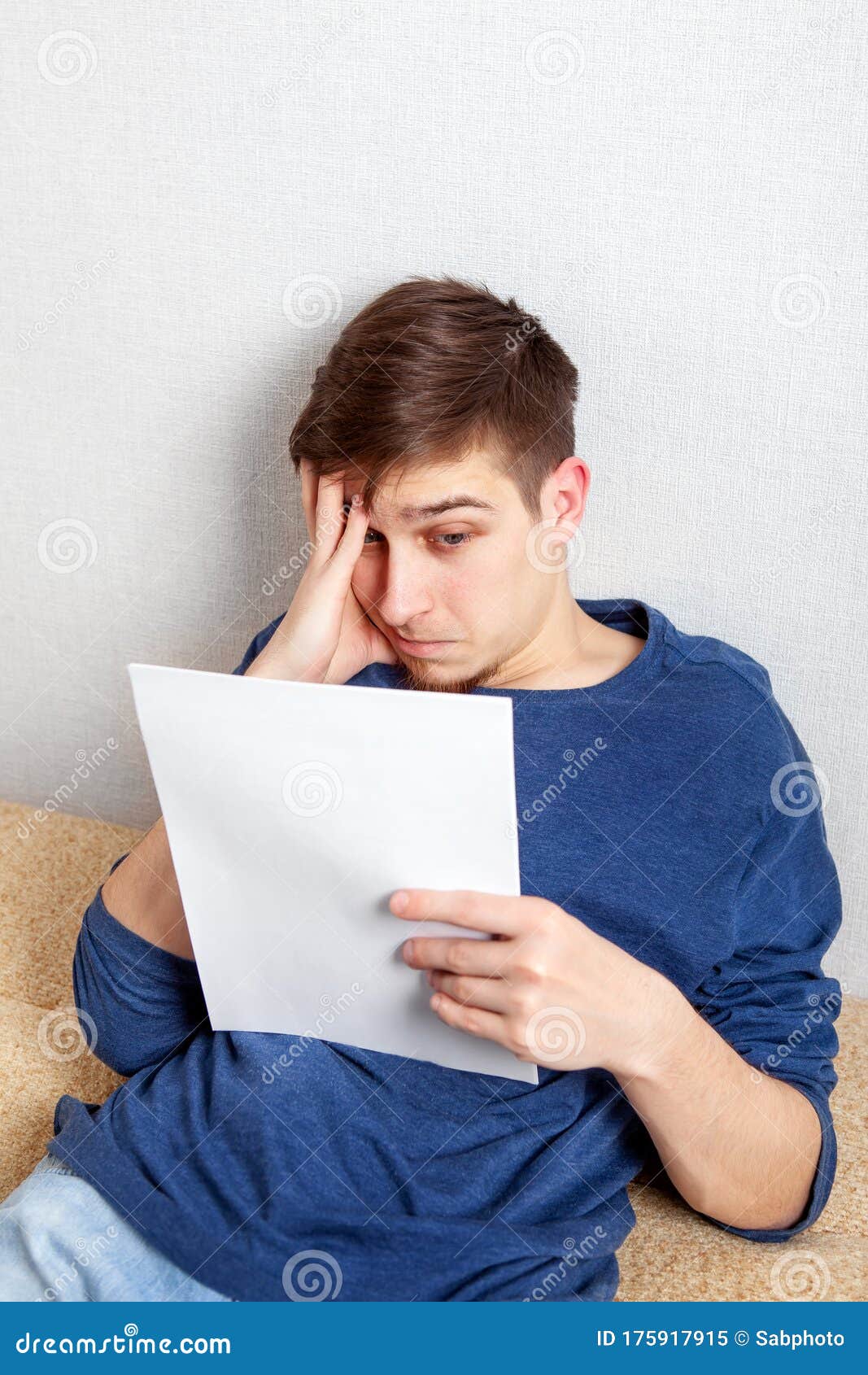 Young Man read a Document stock image. Image of finance - 175917915