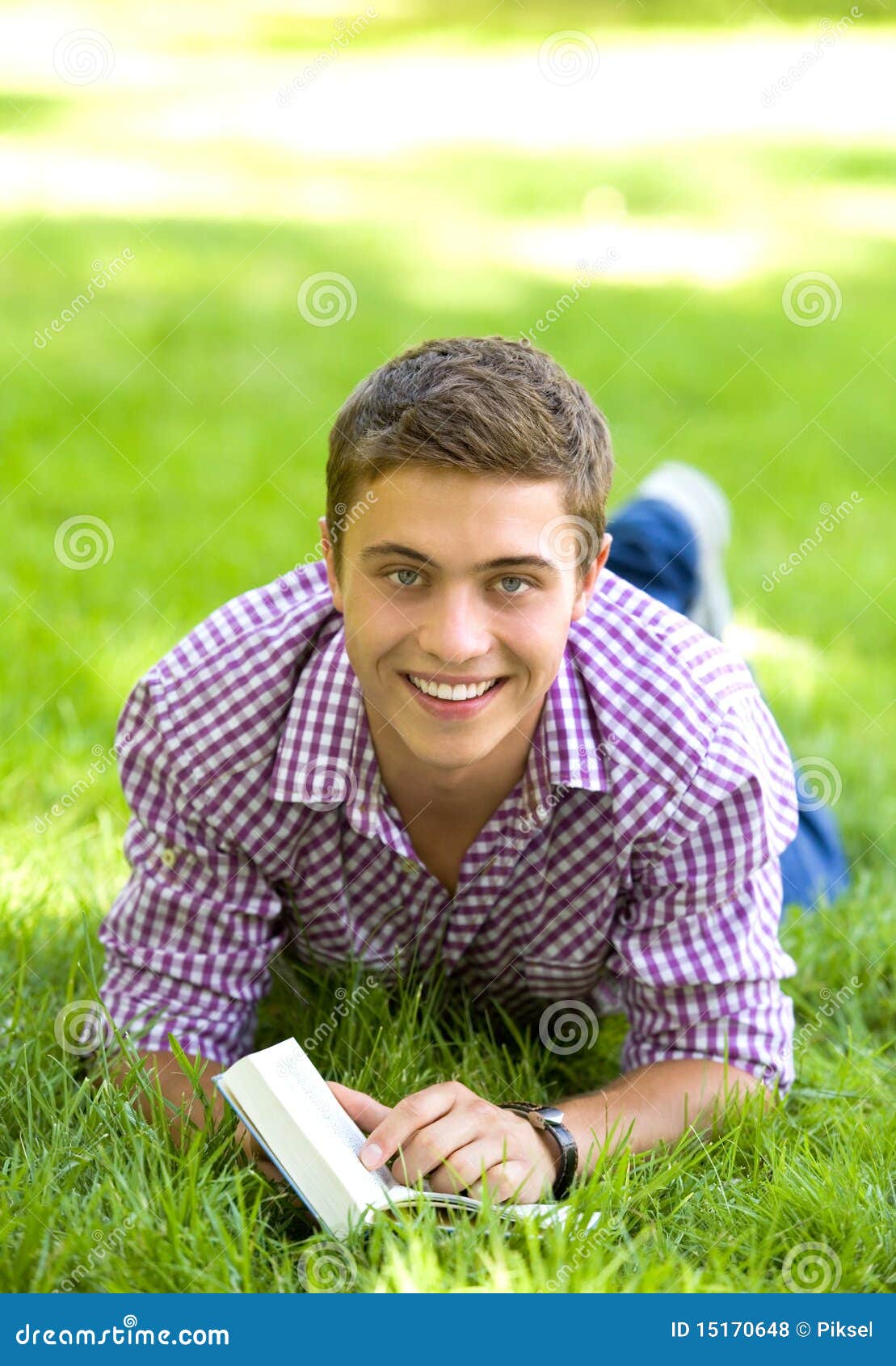 Young man reading book stock photo. Image of person, attractive - 15170648