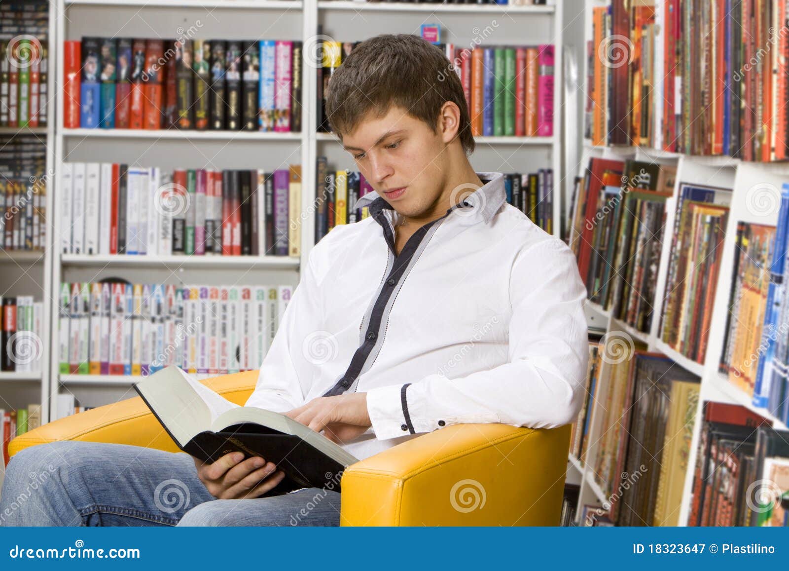 Young man reading book stock image. Image of learning - 18323647