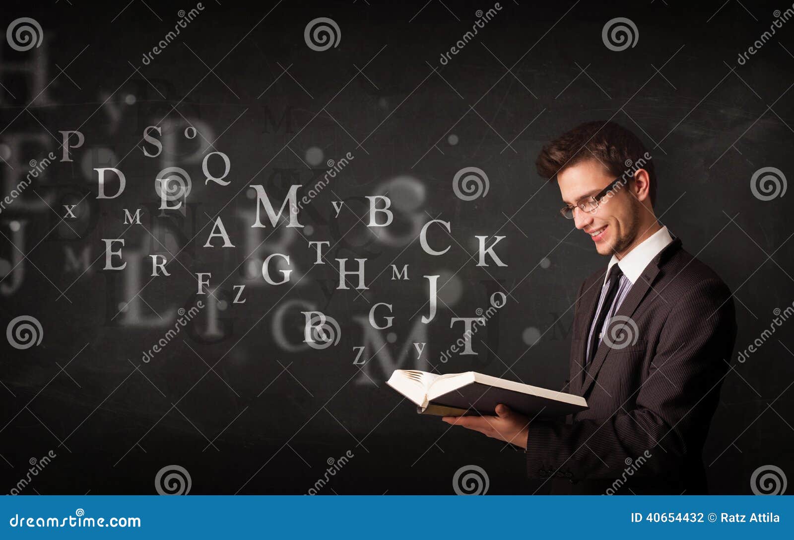 Young Man Reading a Book with Alphabet Letters Stock Photo - Image of ...