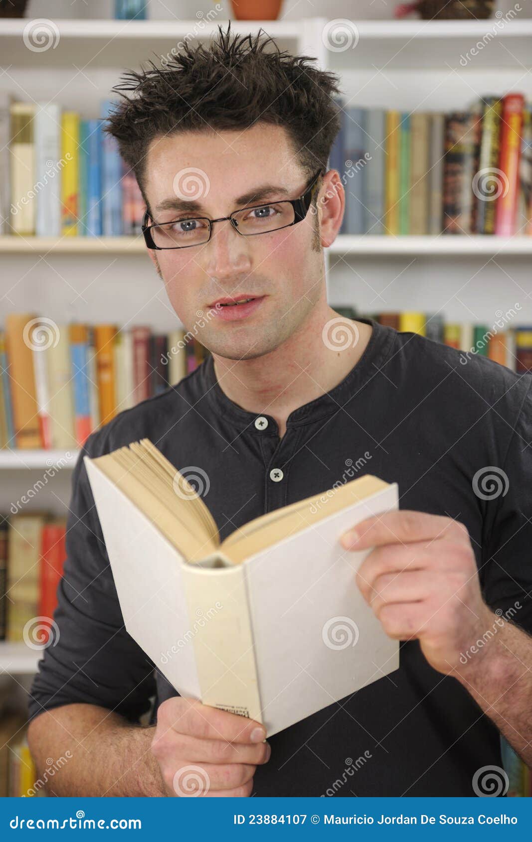 Young Man Reading a Book in Library Stock Image - Image of knowledge ...