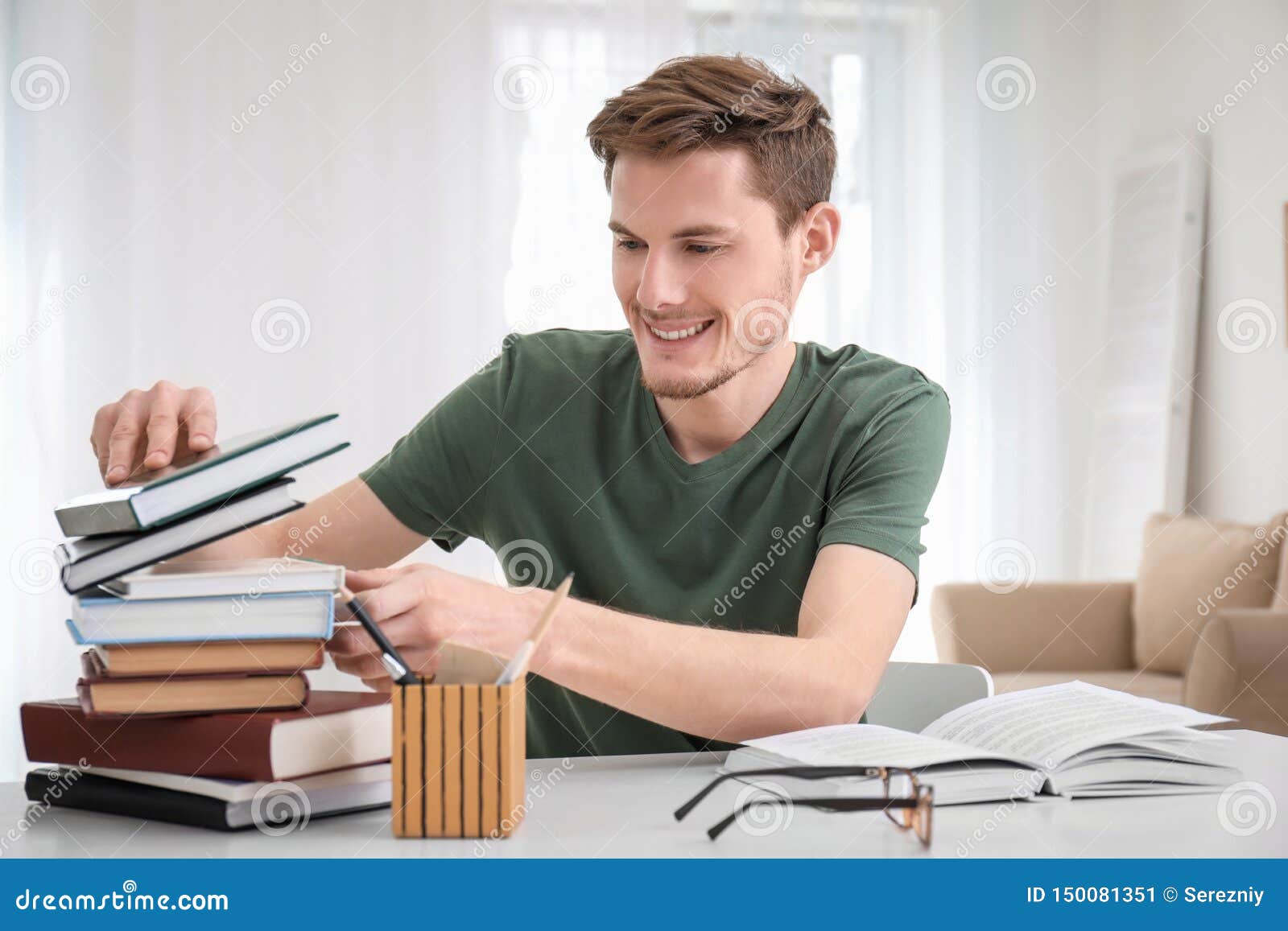 Young Man Reading Books at Home Stock Image - Image of learning, adult ...