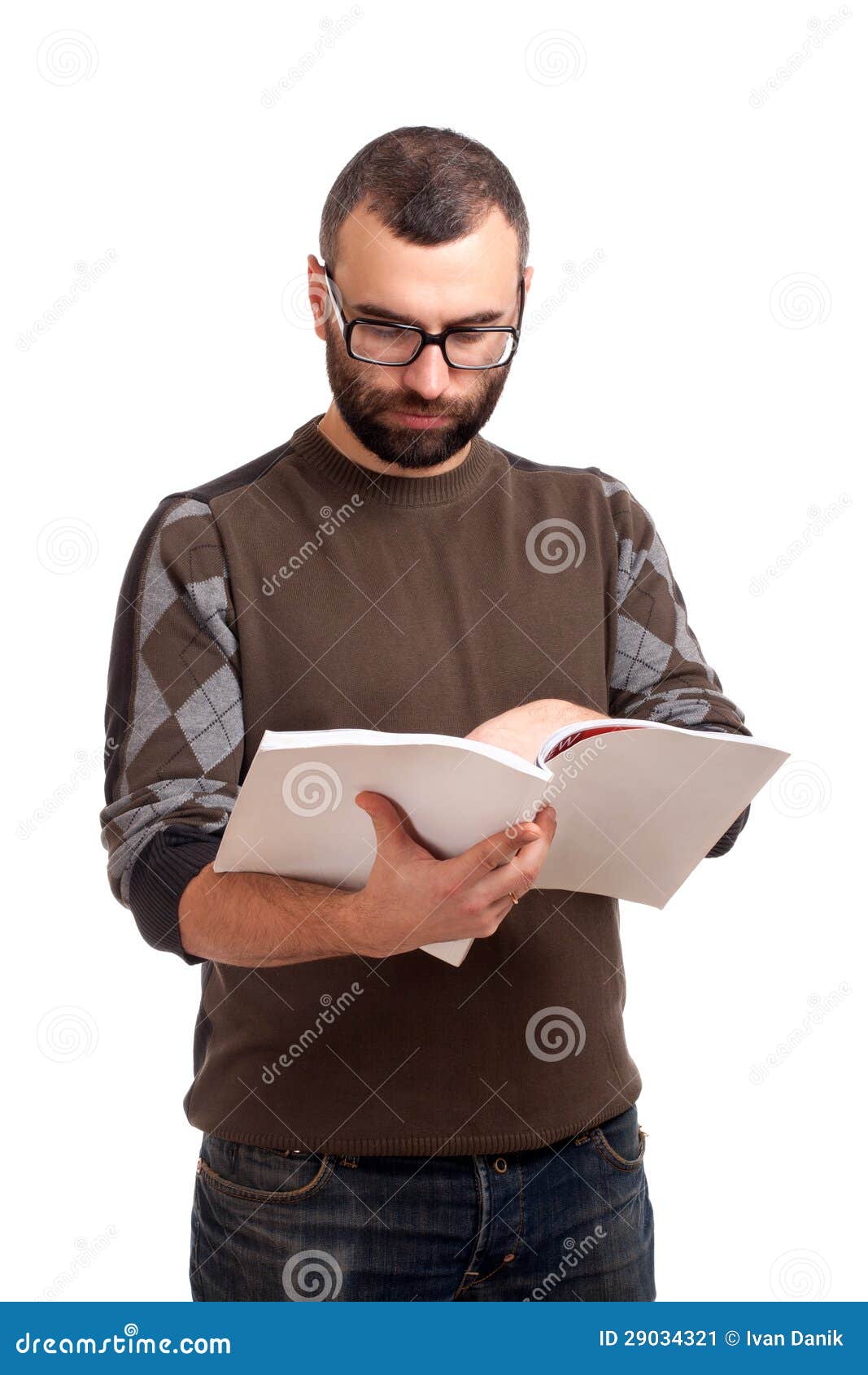 Young man reading magazine stock image. Image of person - 29034321