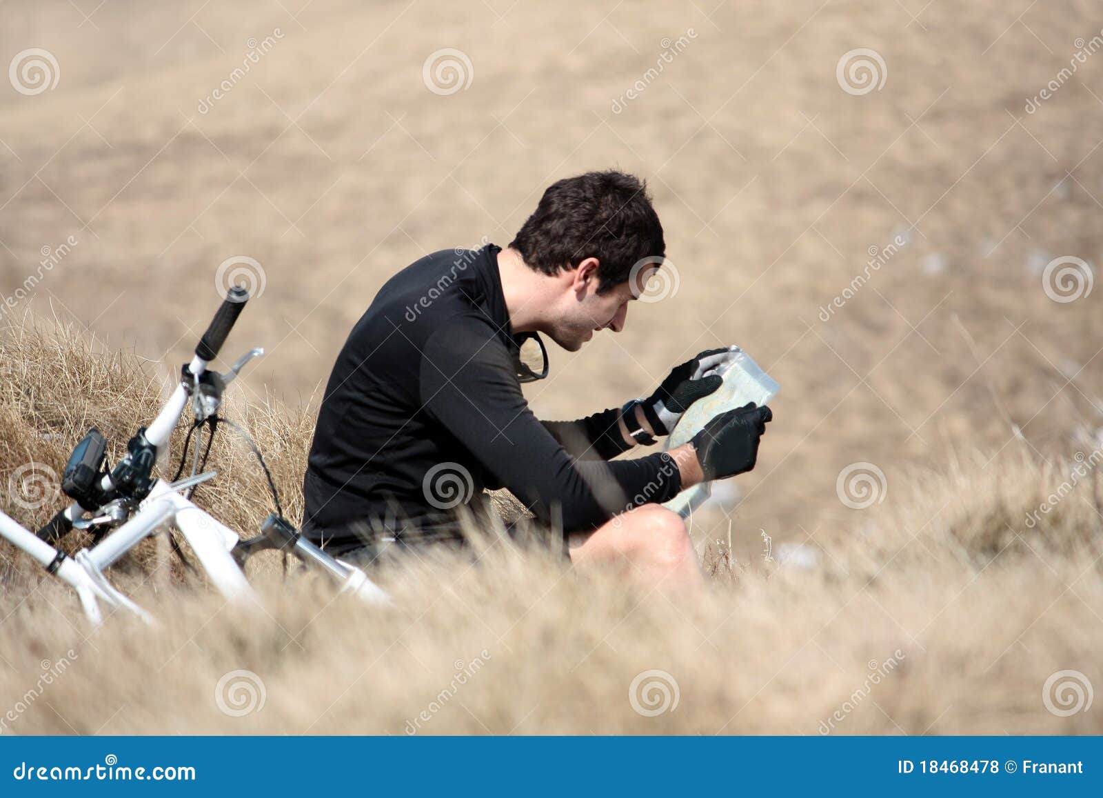 Young man reading a map stock photo. Image of hard, mountain - 18468478