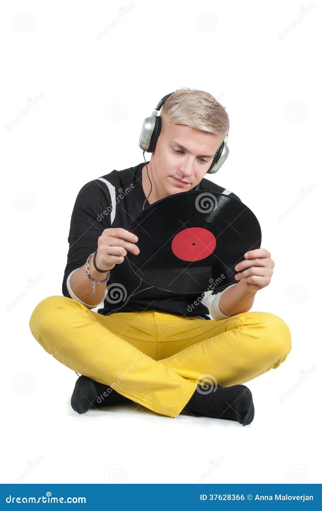 Young Man Reading from Vinyl Record Stock Photo - Image of vinyl ...
