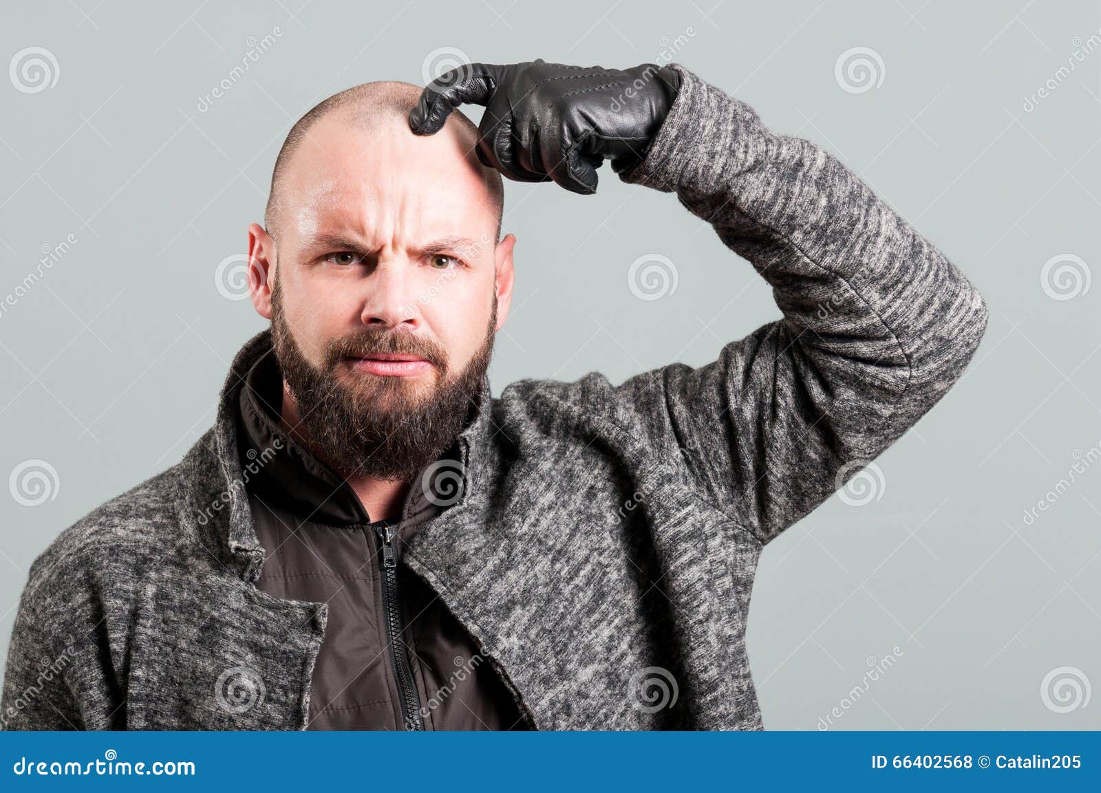 Young Man with Real Beard Scratching Head and Frown Stock Photo - Image ...