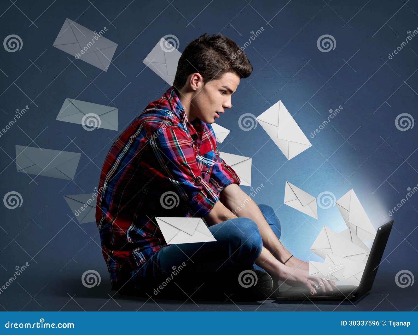Young Man Receiving Tons of Messages on Laptop Stock Photo - Image of ...