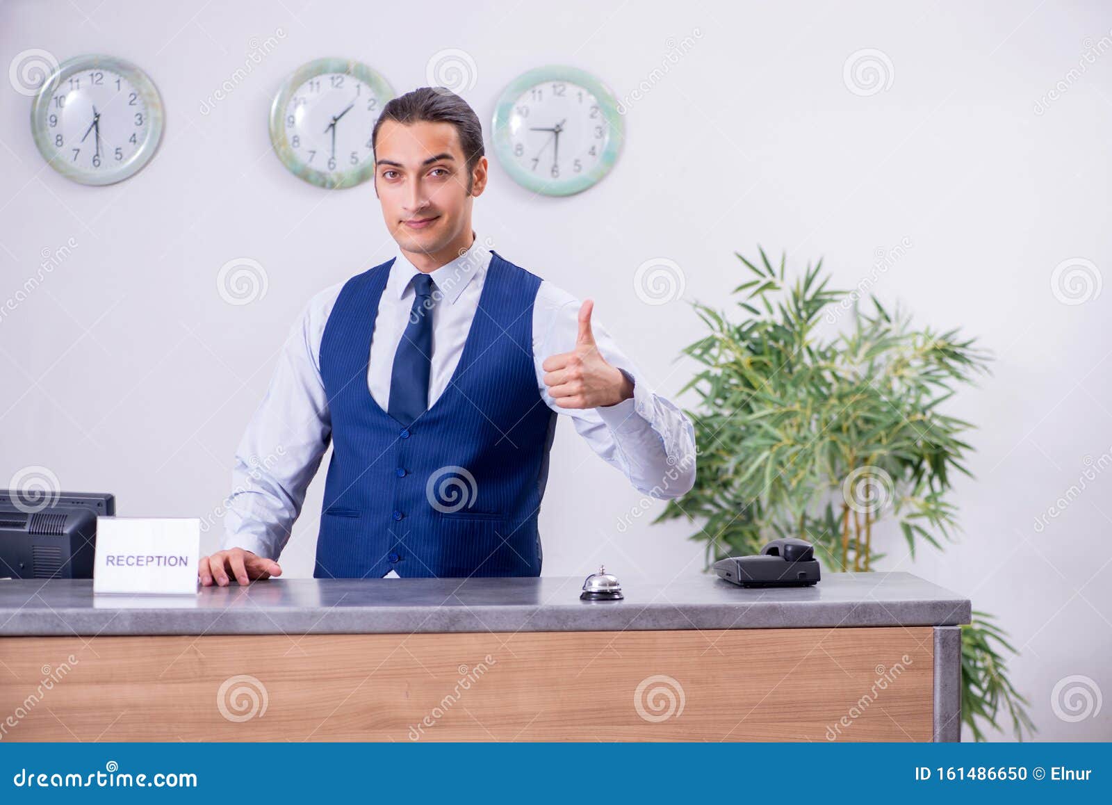 Young Man Receptionist at the Hotel Counter Stock Photo - Image of ...