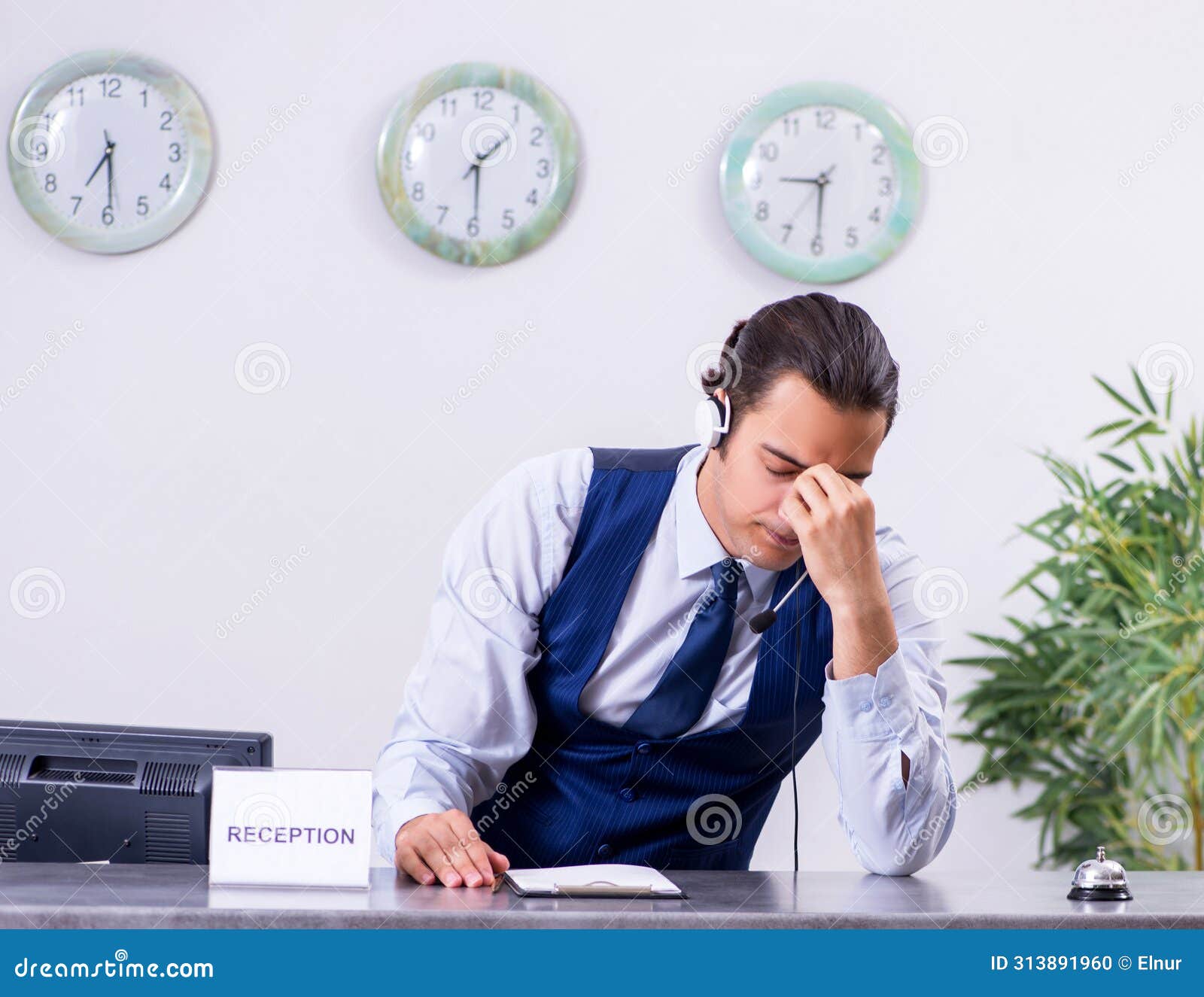 Young Man Receptionist at the Hotel Counter Stock Photo - Image of ...