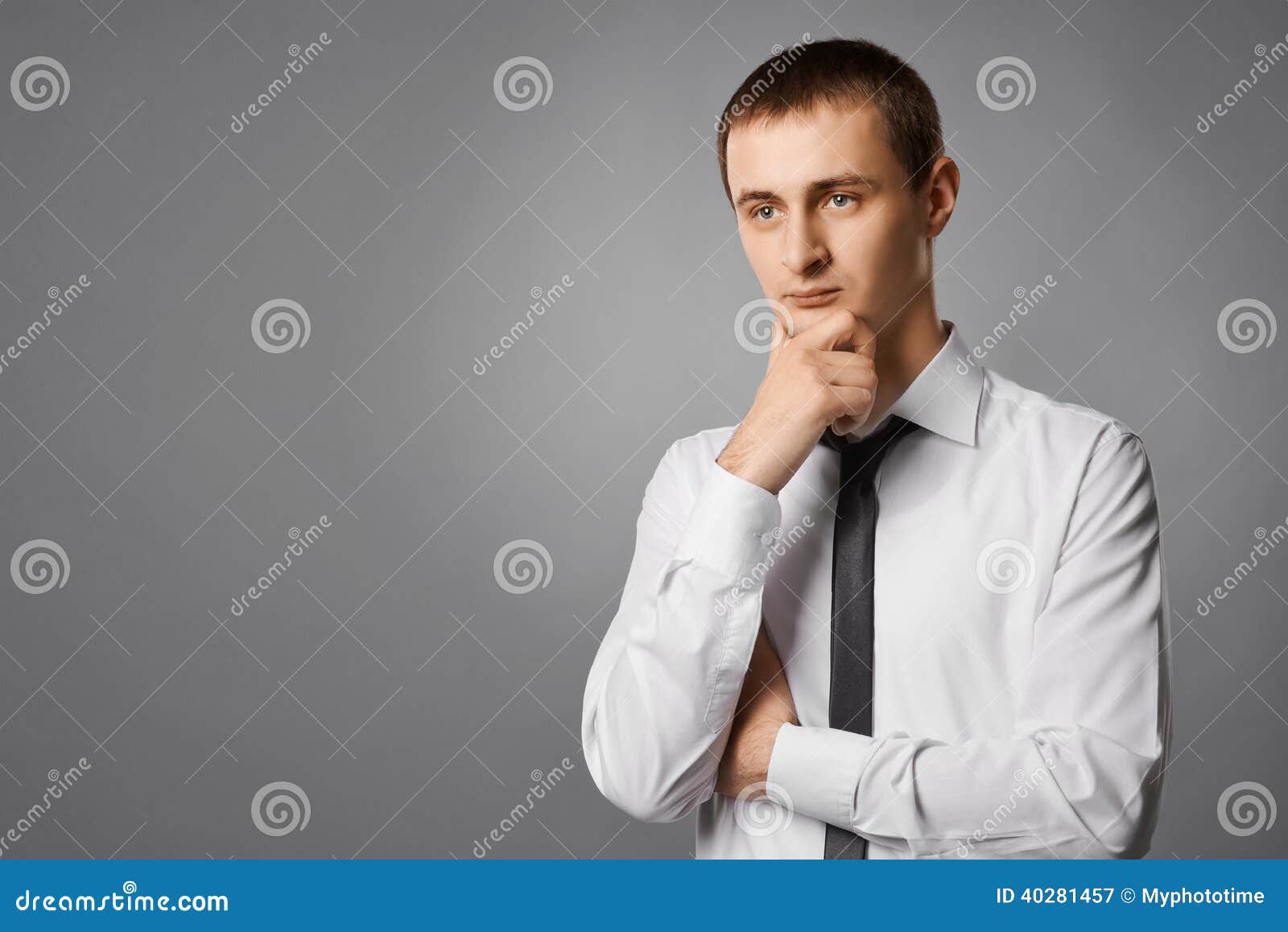 Young Man Reflects Concentrated Stock Image - Image of portrait, hand ...