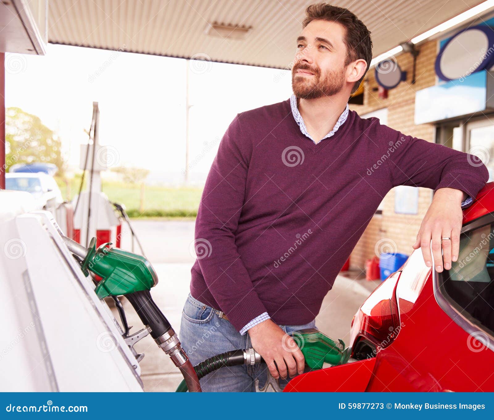 Young Man Refuelling a Car at a Petrol Station Stock Image - Image of ...