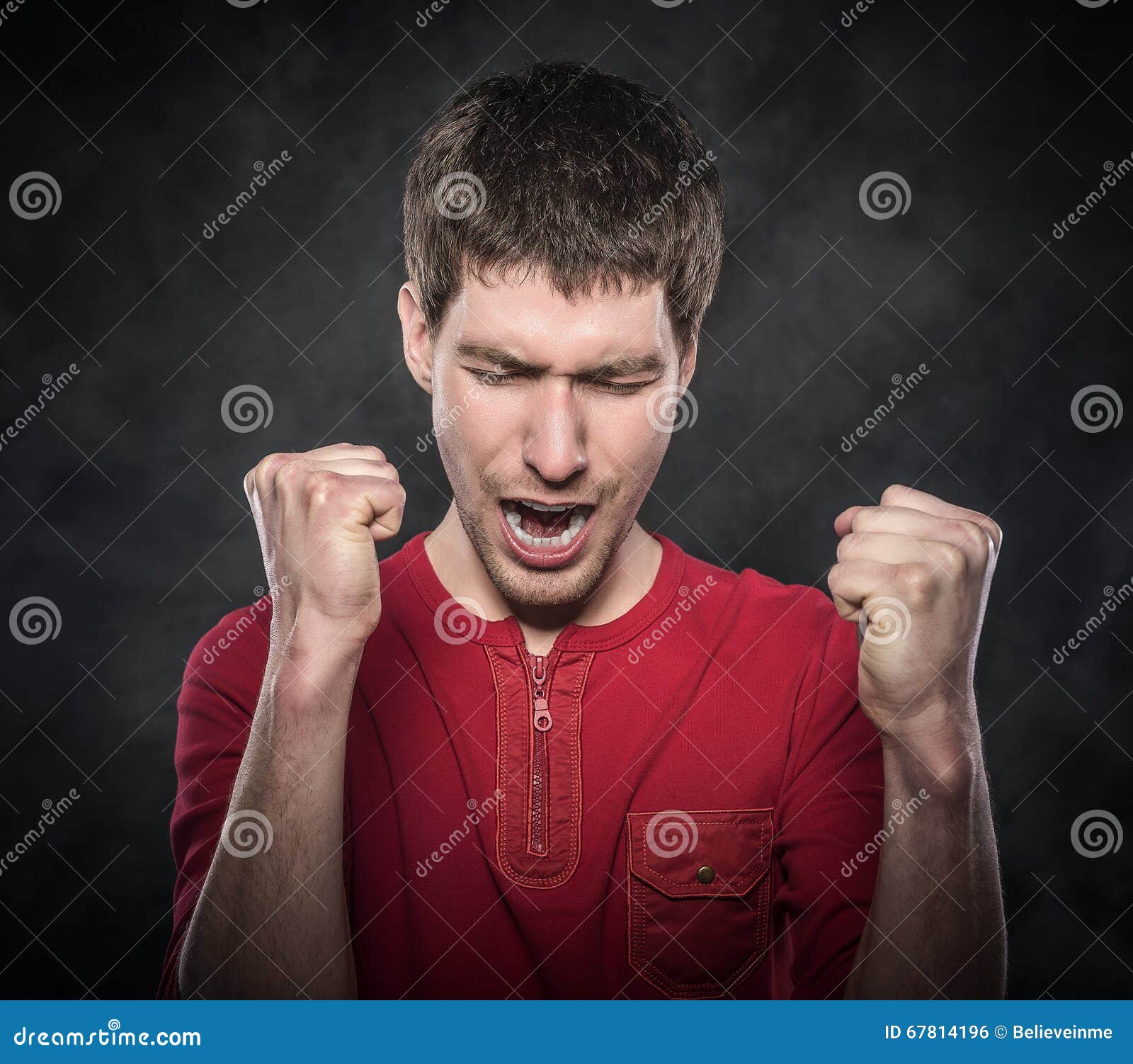 Young man rejoicing. stock photo. Image of celebration - 67814196
