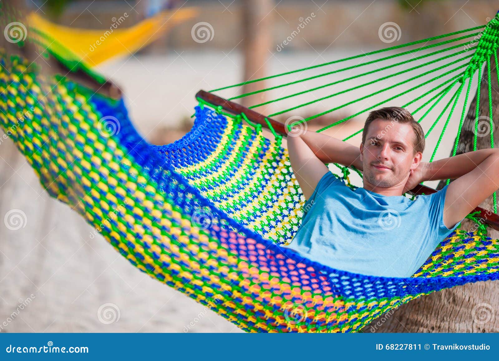 Young man relax in hammock stock image. Image of caucasian - 68227811