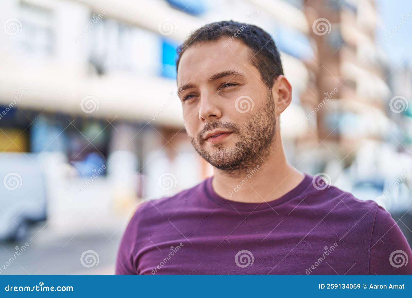 Young Man with Relaxed Expression Standing at Street Stock Image ...