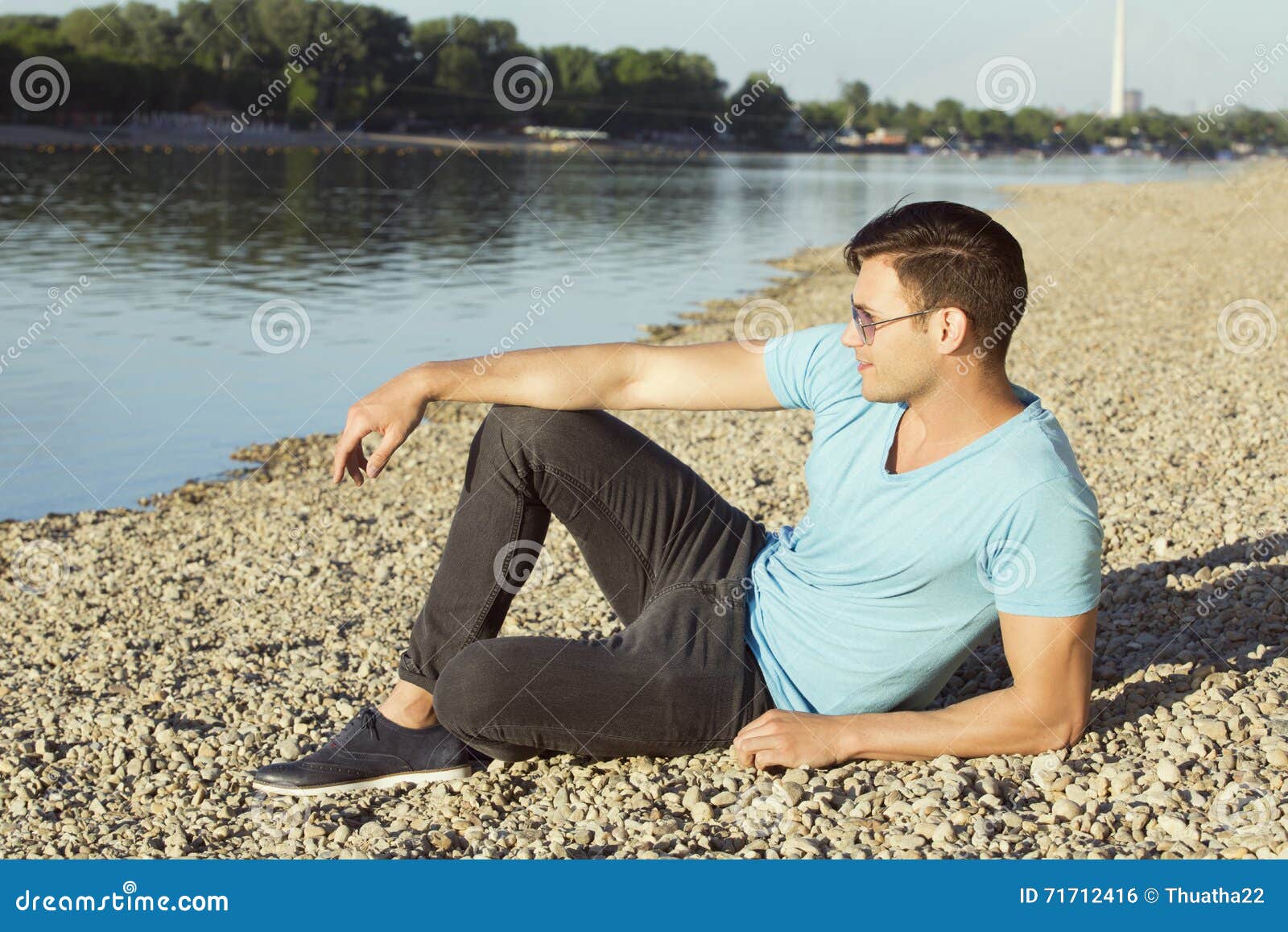 Young Man Relaxing at the Beach Stock Photo - Image of beach, nature ...
