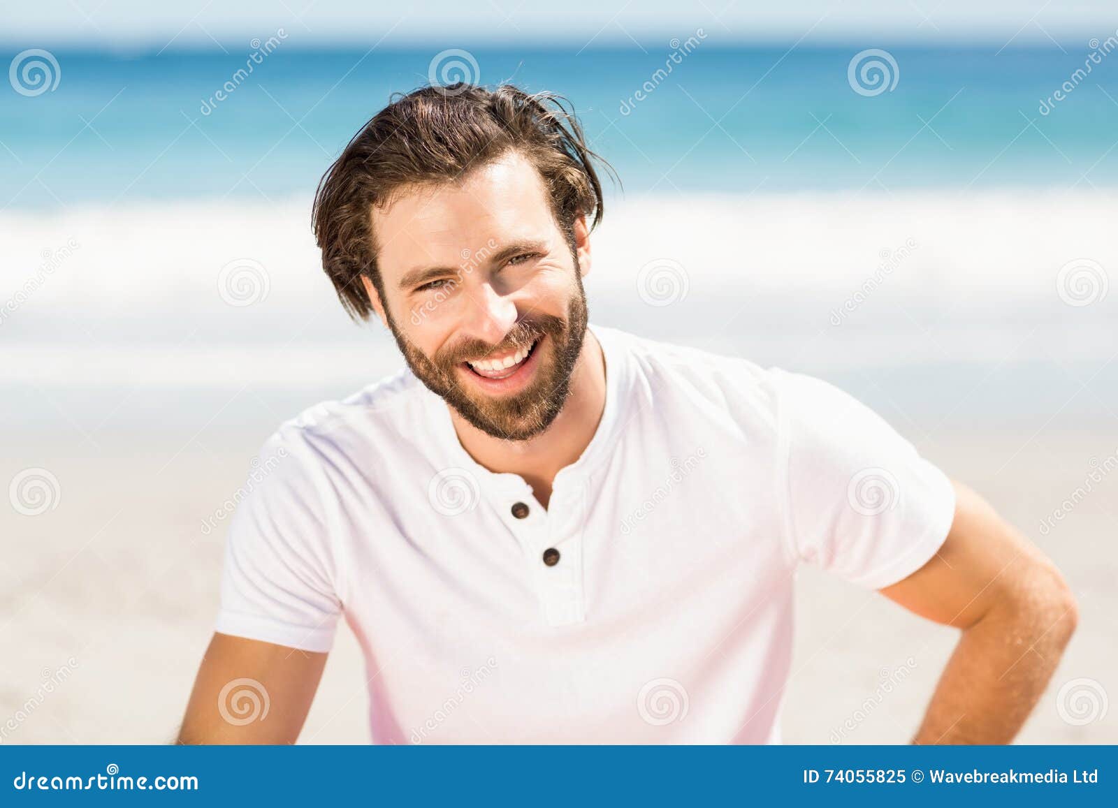 Young Man Relaxing on Beach Stock Image - Image of clothing, happy ...