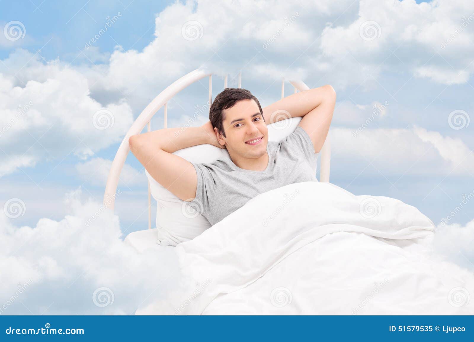 Young Man Relaxing on a Comfortable Bed Stock Image - Image of cheerful ...