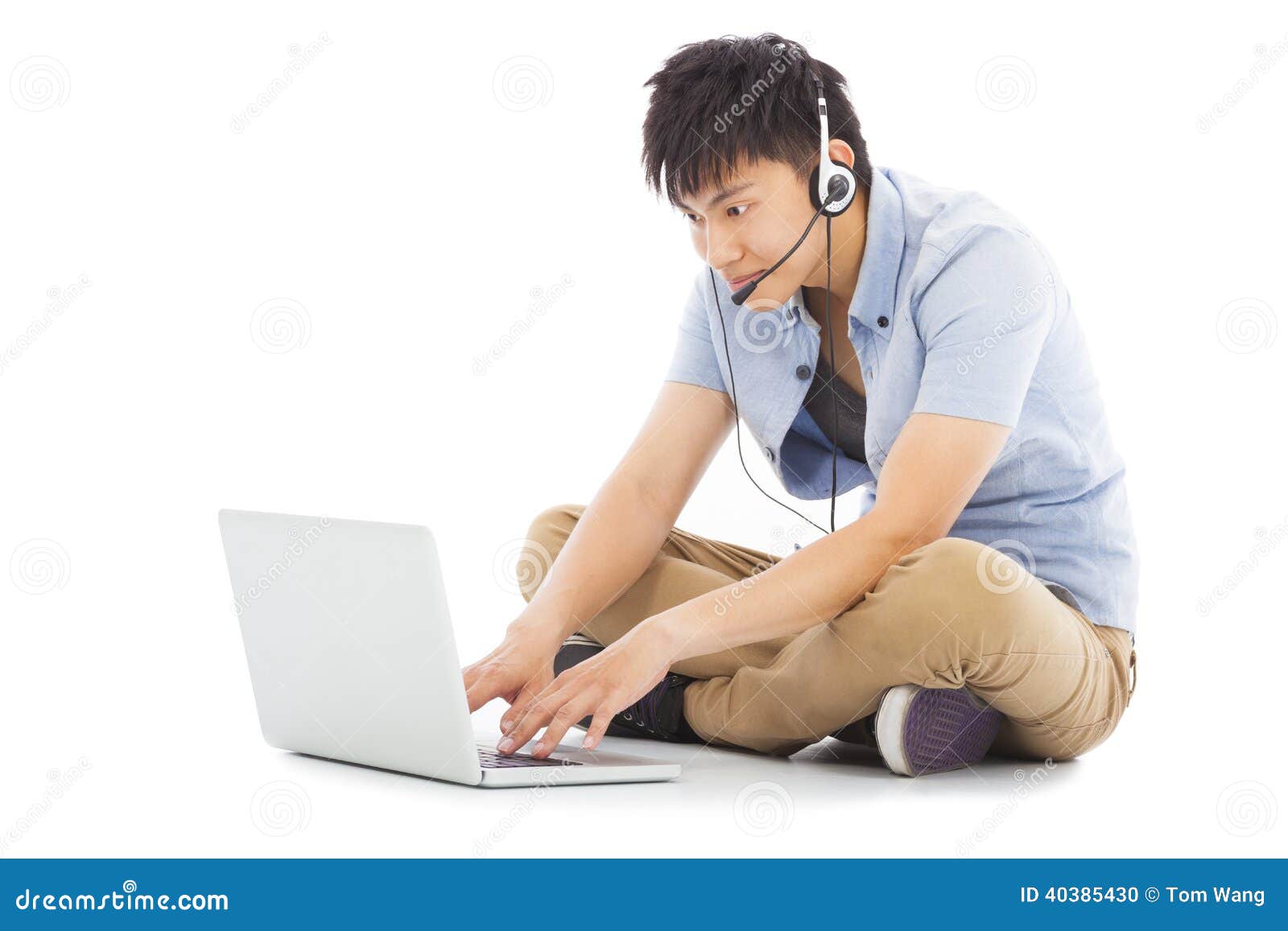 Young Man Relaxing on Floor and Learning Language Stock Photo - Image ...