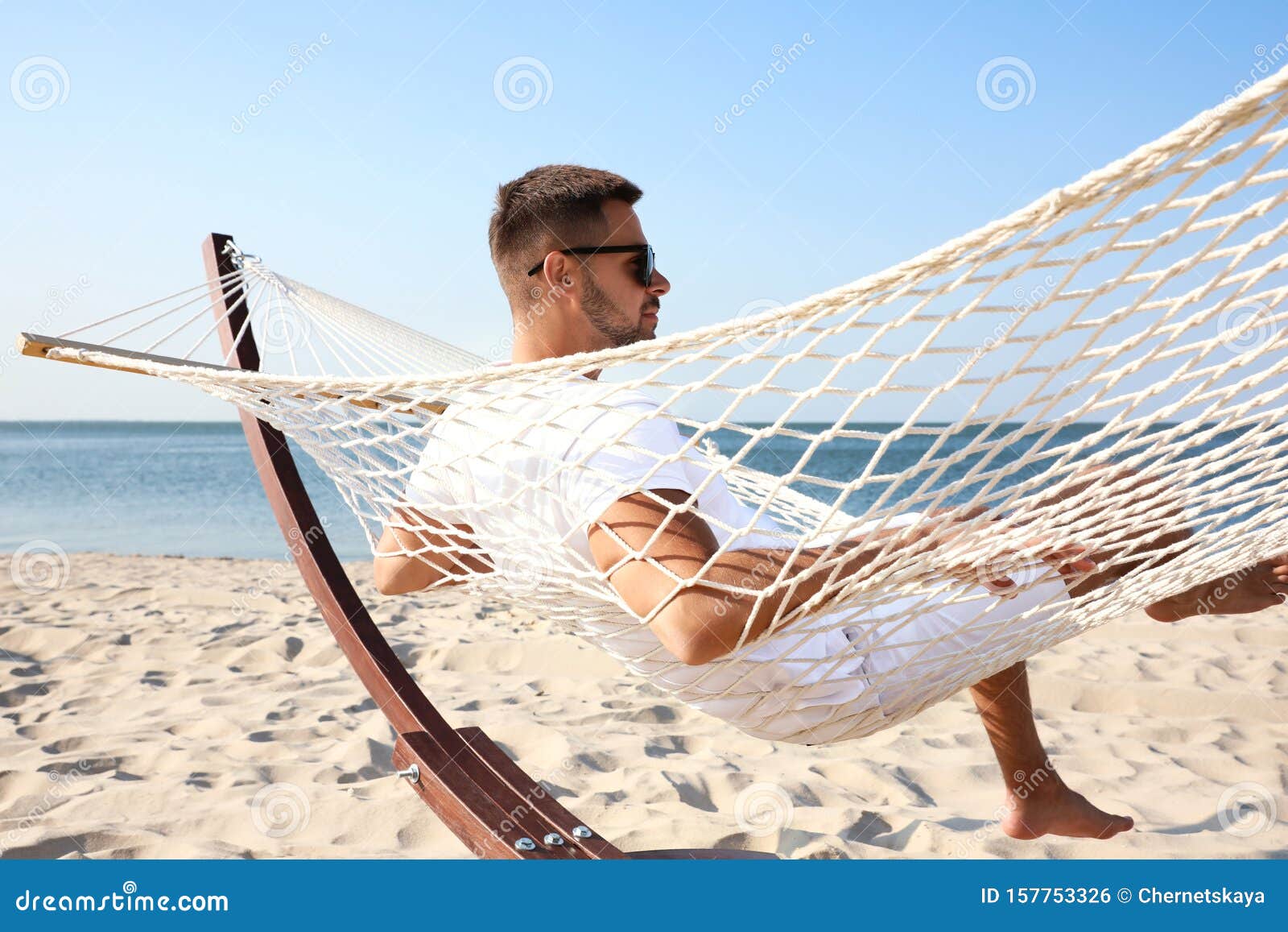 Young Man Relaxing in Hammock Stock Photo - Image of paradise, male ...