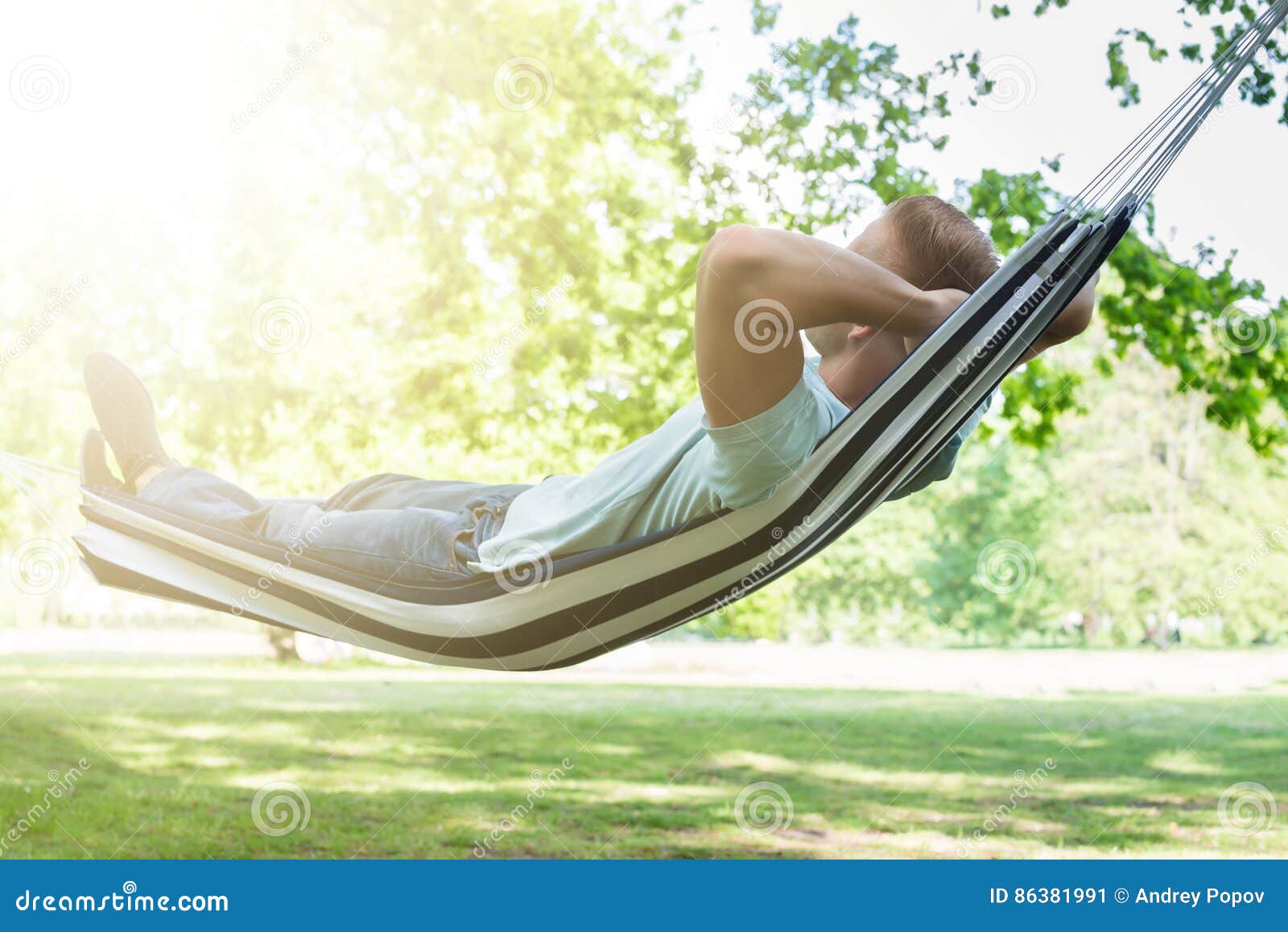 Man Relaxing in Hammock stock image. Image of relax, nature - 86381991