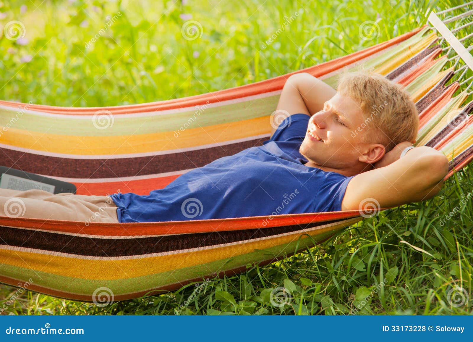 Young Man Relaxing in Hammock Stock Photo - Image of enjoyment, outside ...