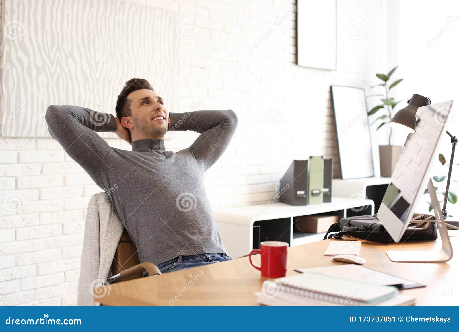 Young Man Relaxing in Office during Break Stock Image - Image of coffee ...
