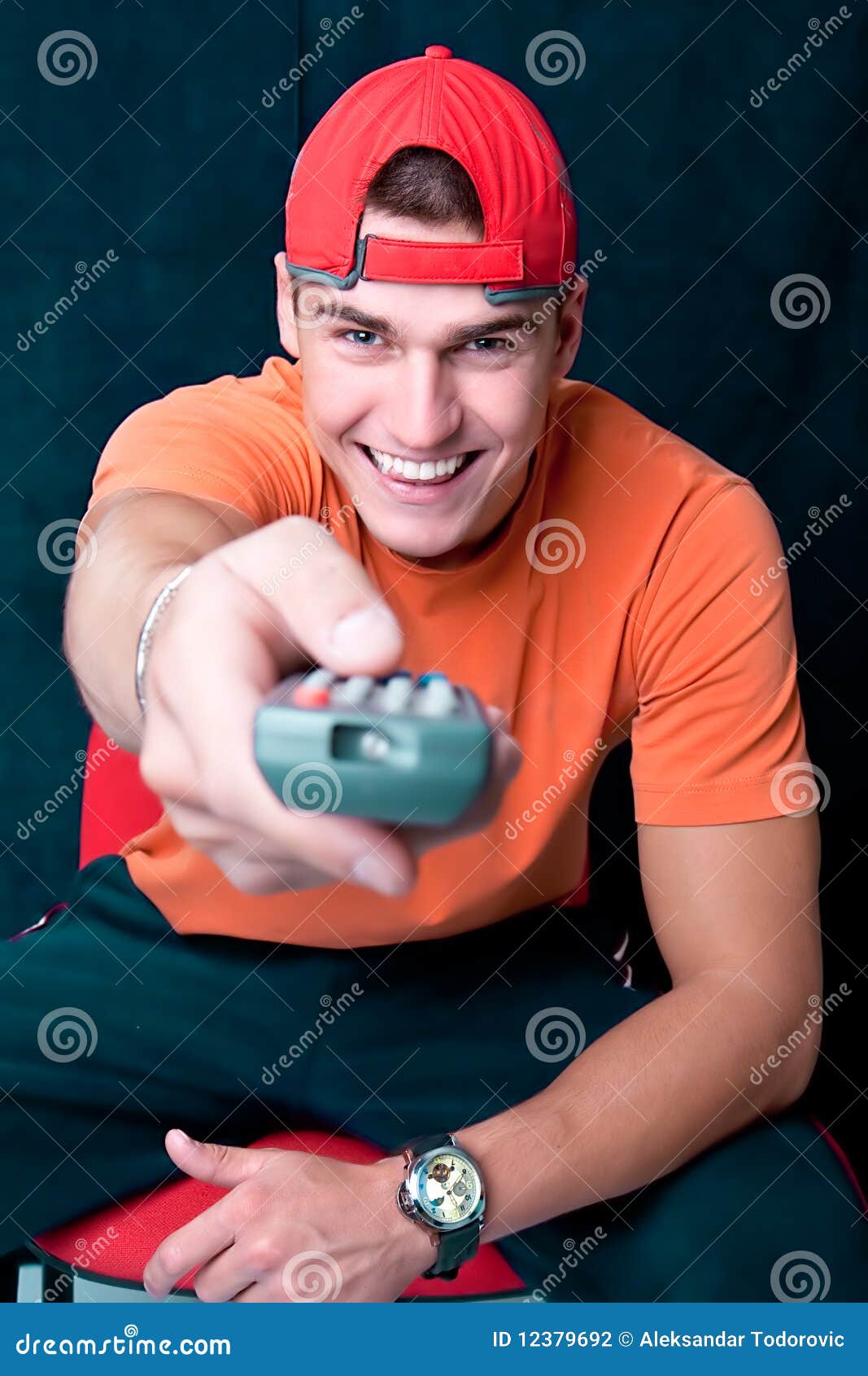 Young Man with a Remote Control Stock Photo - Image of handsome, fresh ...