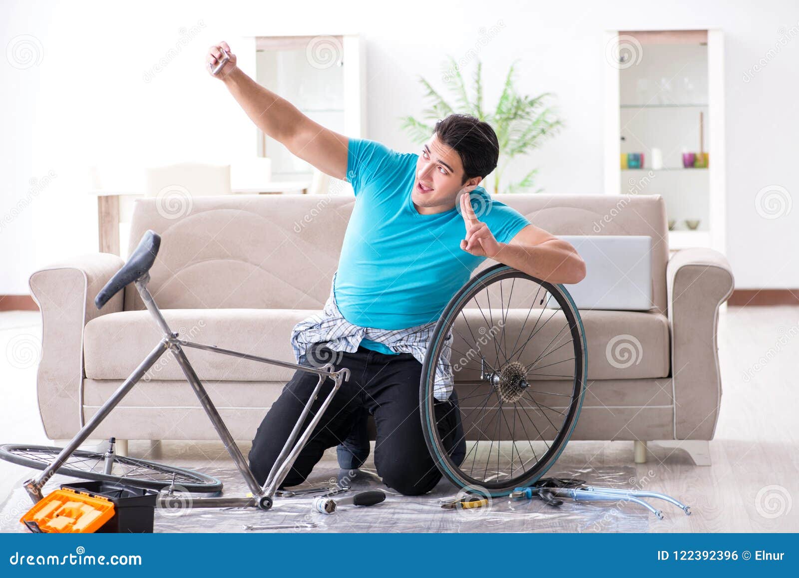 The Young Man Repairing Bicycle at Home Stock Photo - Image of repair ...