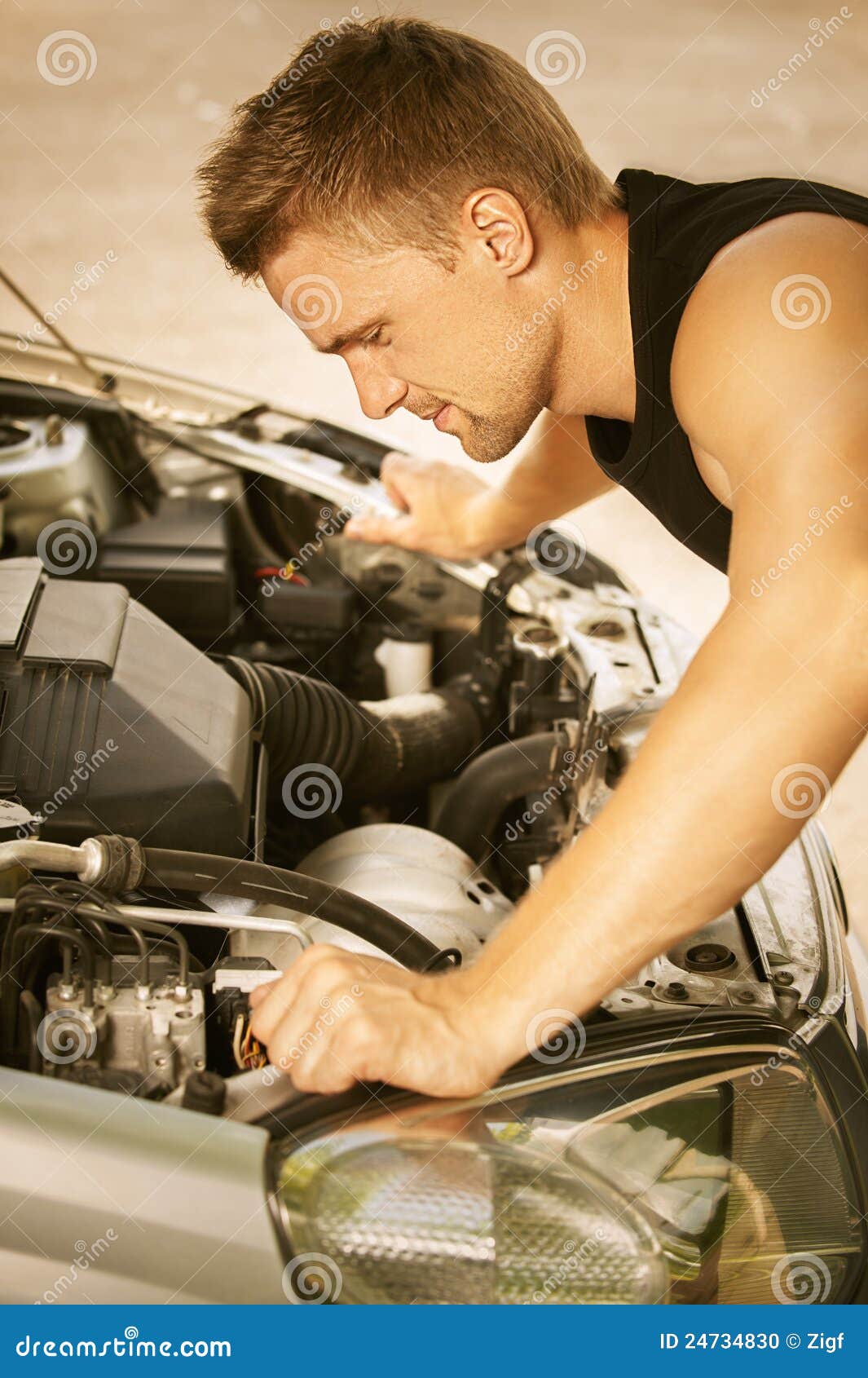 Young man repairing car stock photo. Image of motor, hair - 24734830
