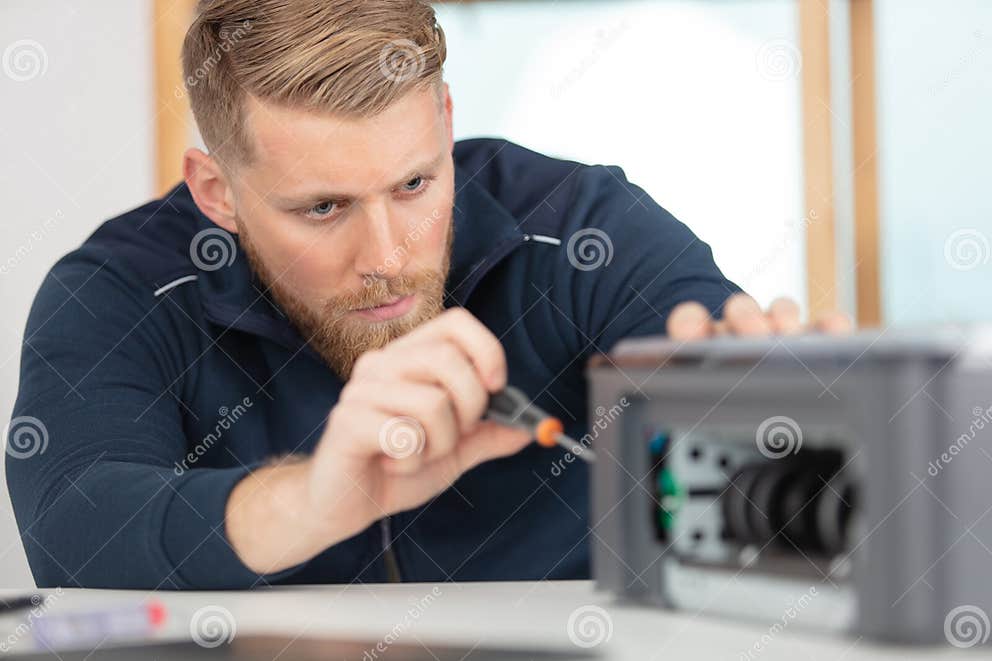Young Man Repairing Computer Stock Photo - Image of technical, object ...