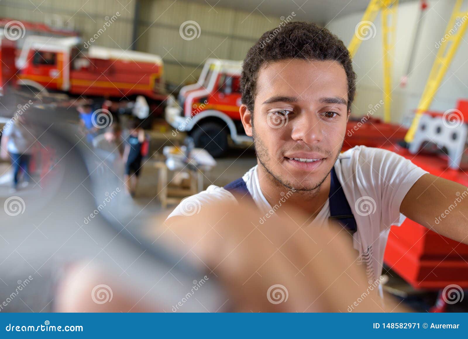 Young Man Repairs Truck on Lift Stock Image - Image of cabin ...