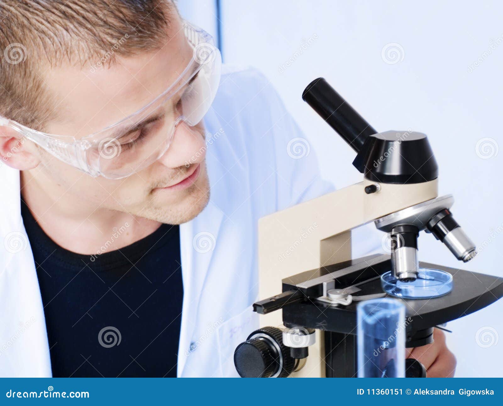 Young Man Researching on a Microscope Stock Image - Image of chemistry ...