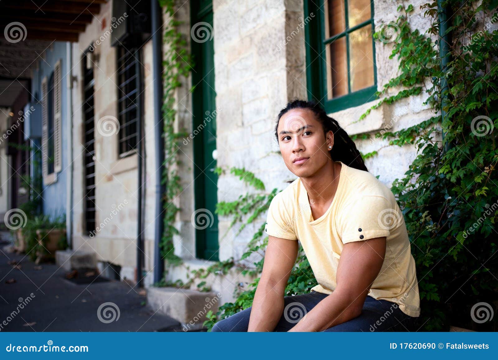 Young Man Resting Outside stock photo. Image of asian - 17620690