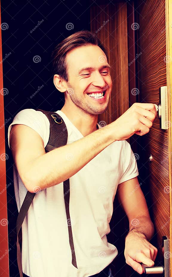 Young Man Returning Home from Work or Trip Stock Photo - Image of ...