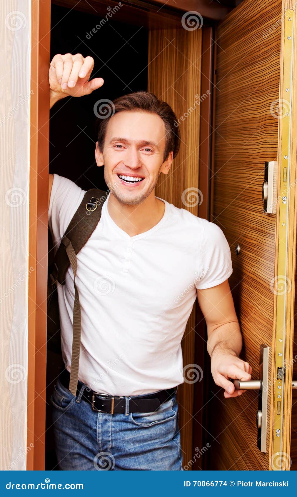 Young Man Returning Home from Work or Trip Stock Photo - Image of home ...