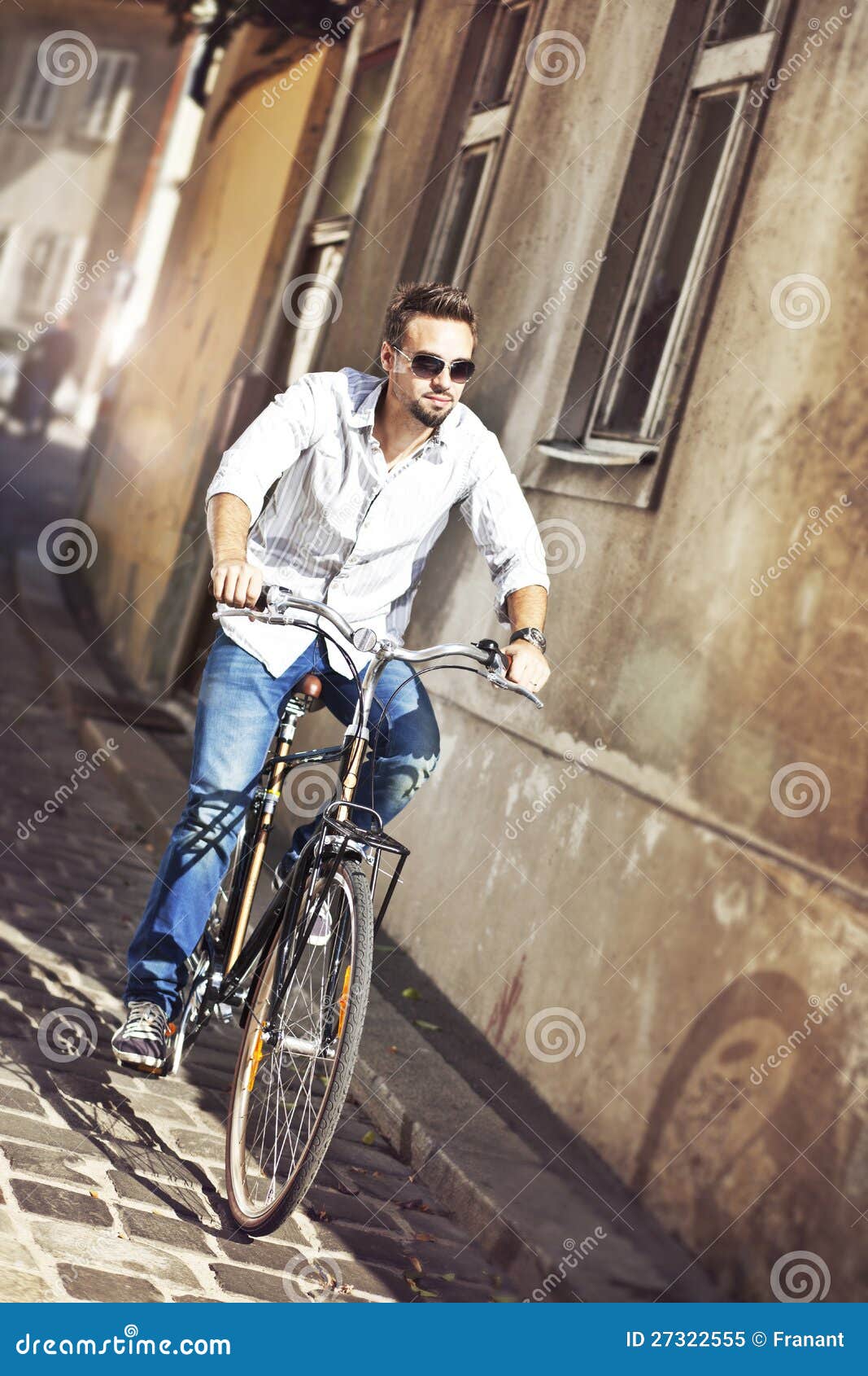 Young man riding bicycle stock image. Image of retro - 27322555